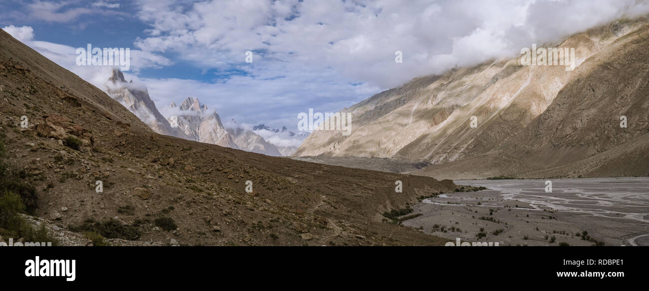 Panorama of sunlit peaks of Trango Towers in Karakoram Mountain Range ...