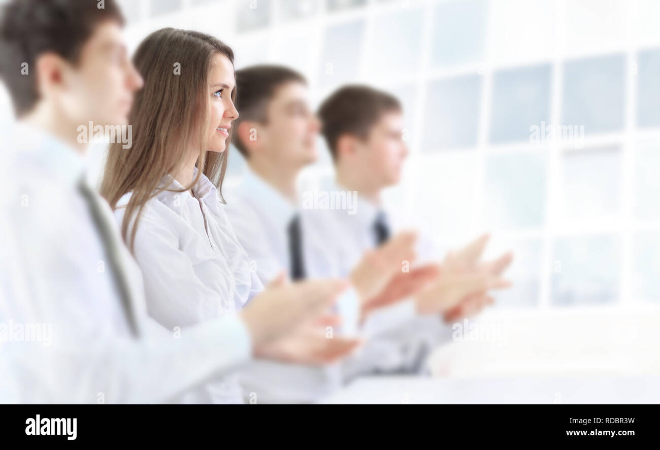 Happy business group applauding at the office Stock Photo - Alamy