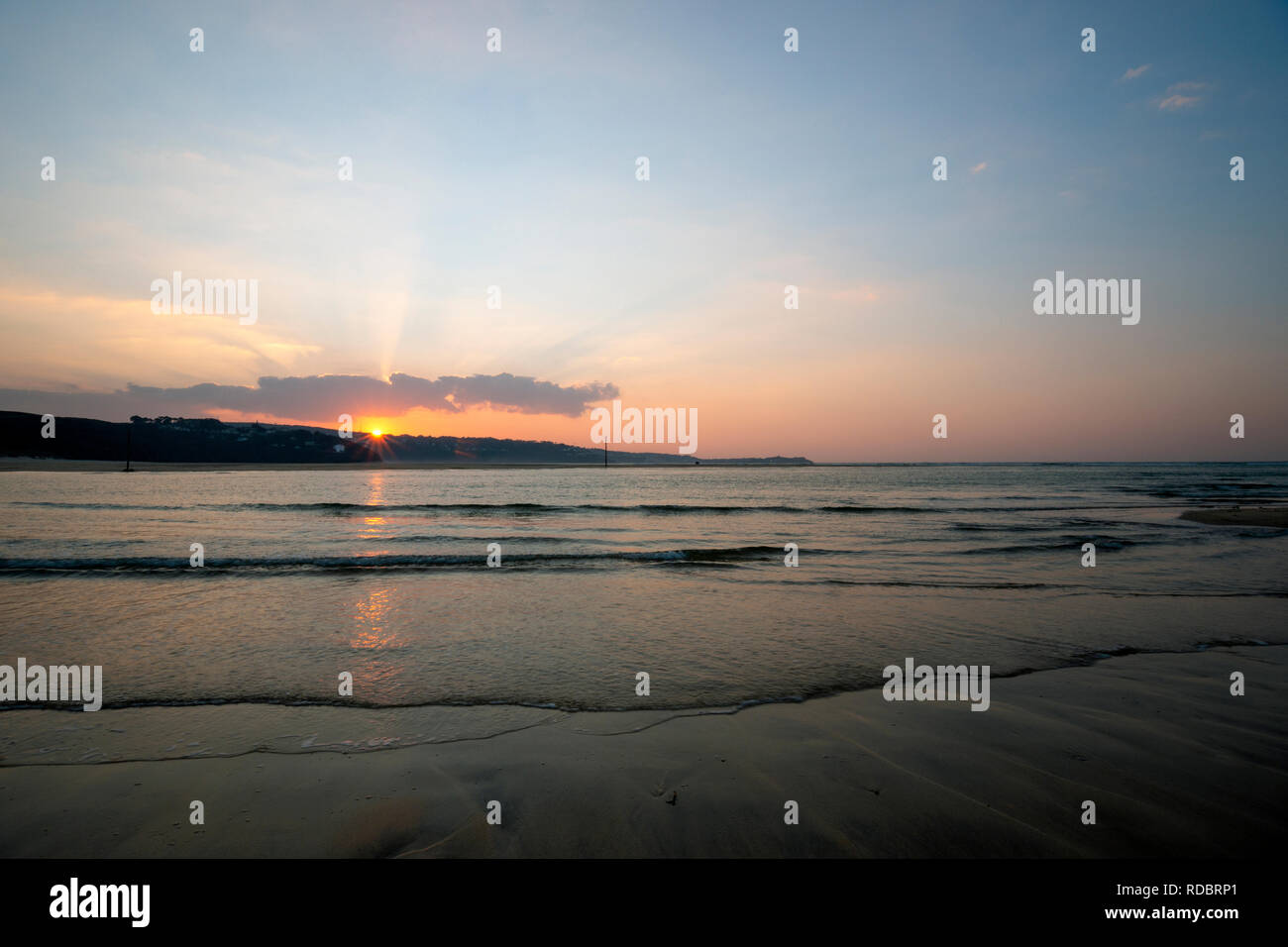 Sunset on Hayle Beach looking towards St Ives Stock Photo - Alamy