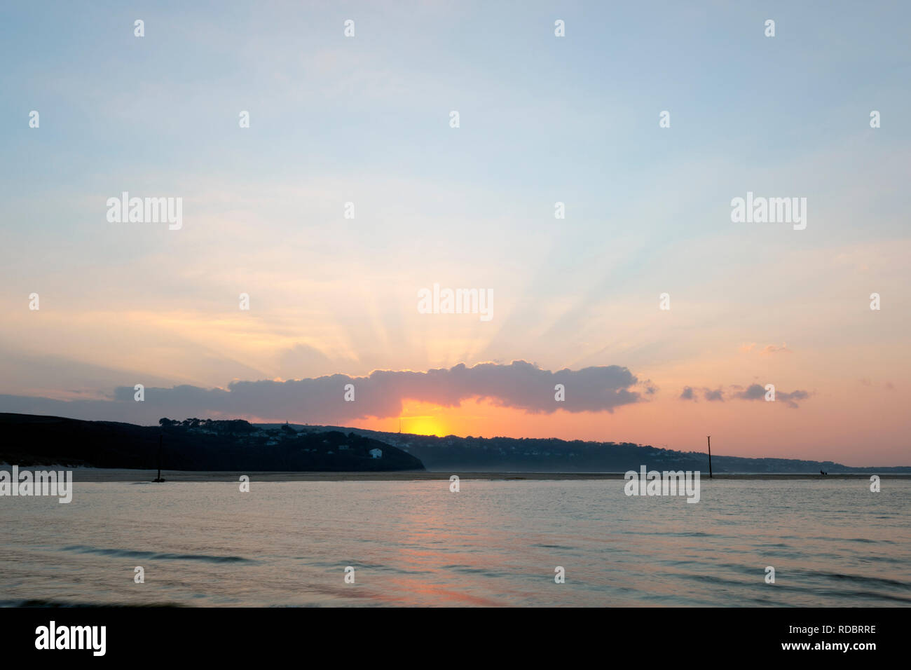 Sunset on Hayle Beach looking towards St Ives Stock Photo - Alamy