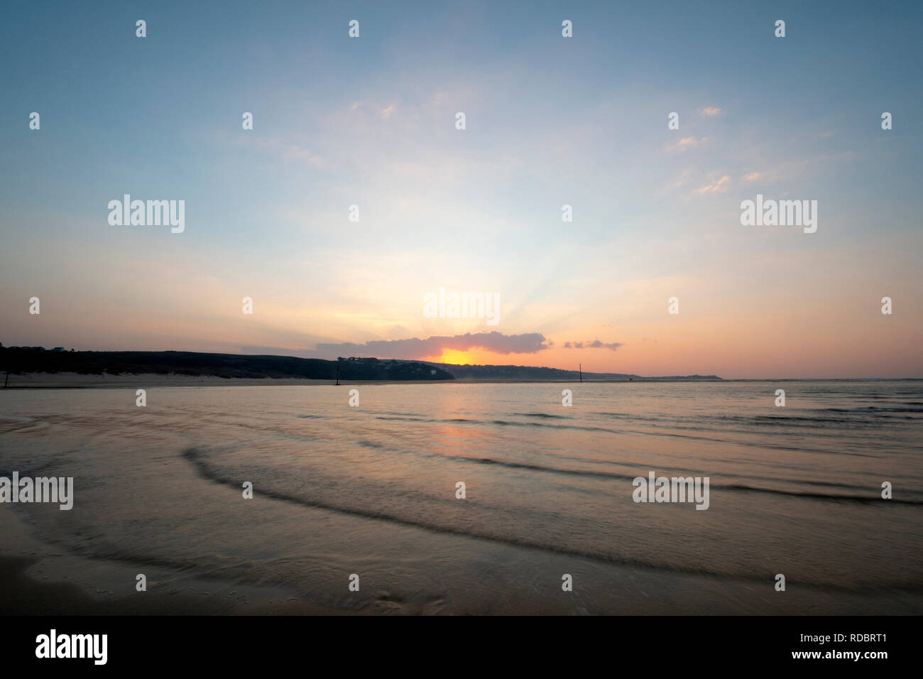 Sunset on Hayle Beach looking towards St Ives Stock Photo - Alamy