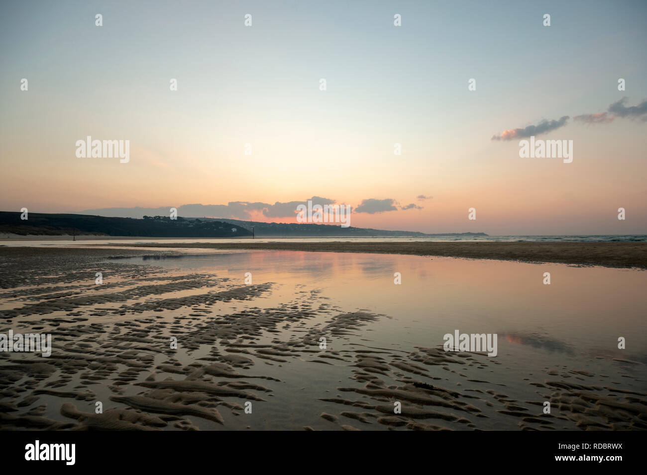 Sunset on Hayle Beach looking towards St Ives Stock Photo - Alamy
