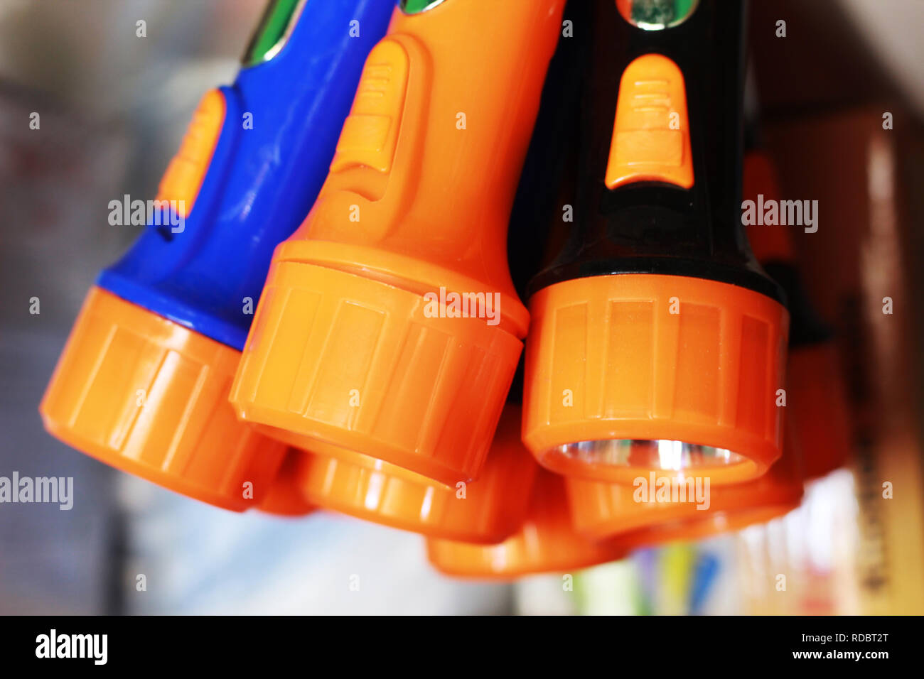 colorful torch light hanging in a wall Stock Photo - Alamy