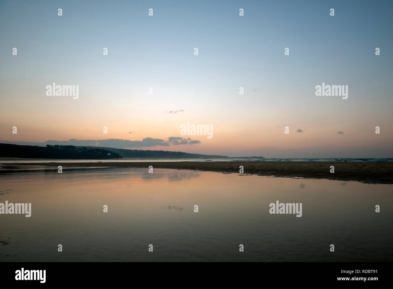 Sunset on Hayle Beach looking towards St Ives Stock Photo - Alamy