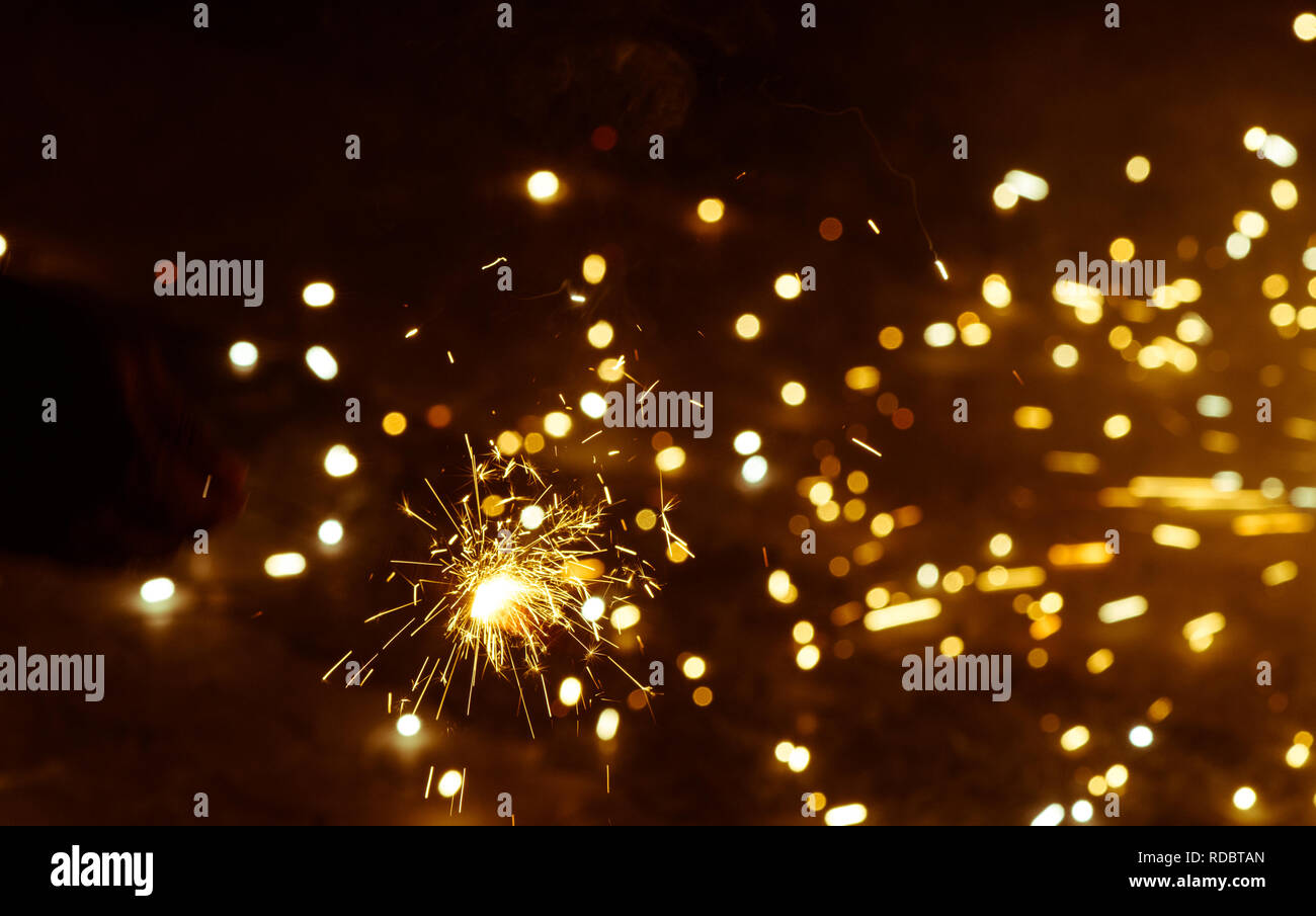 Sparkling firecrackers on diwali celebration Stock Photo - Alamy