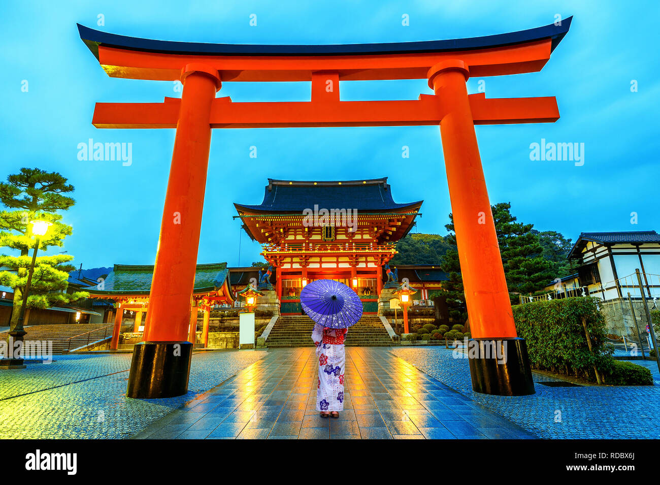Asian women in traditional japanese kimonos at Fushimi Inari Shrine in ...