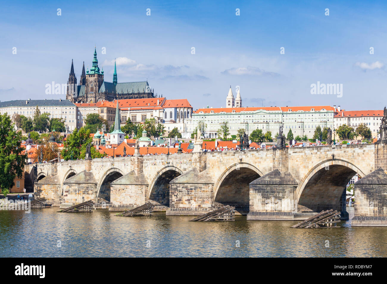 Prague skyline with Prague castle st vitus cathedral Prague Charles bridge over the river Vltava ...