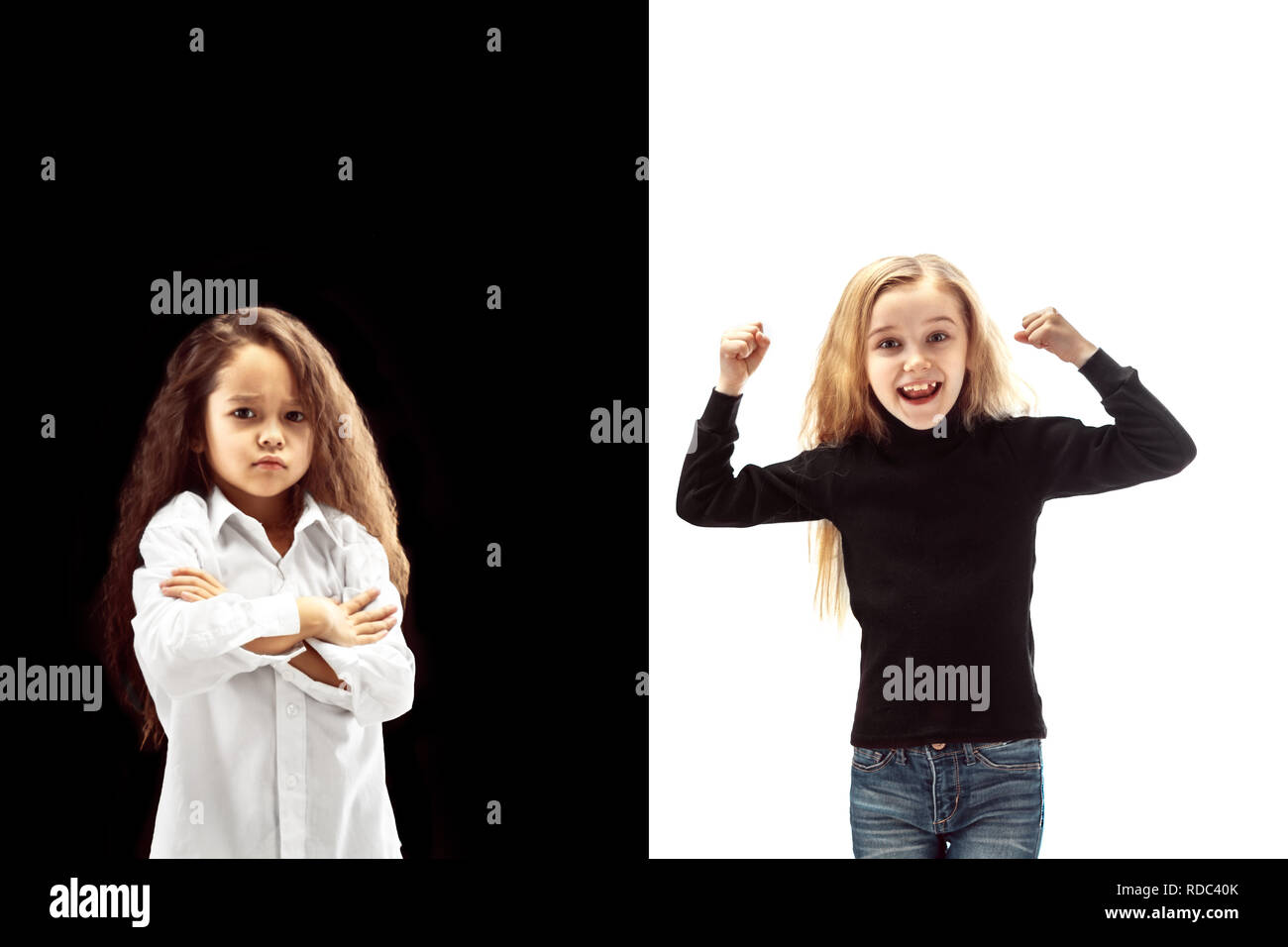 The portrait of emotional happy winner girl and serious girl on a white ... The portrait of emotional happy winner girl and serious girl on a white ...