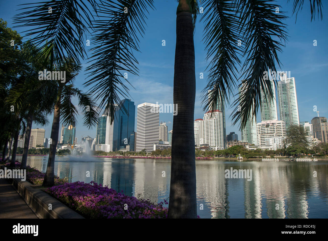 the skyline at the Ratchada Lake at the Ratchada Park in the city of ...