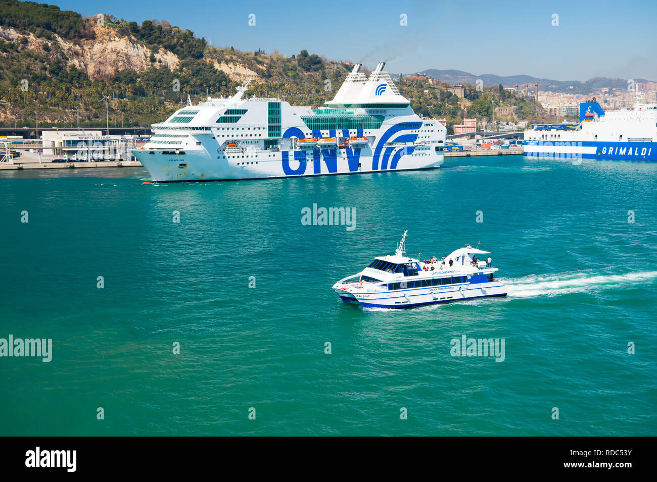 Barcelona, Spain - March 30, 2016: pleasure boat and cruise ships GNV ...
