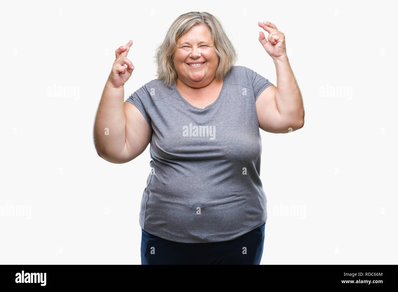 Senior plus size caucasian woman over isolated background smiling ...