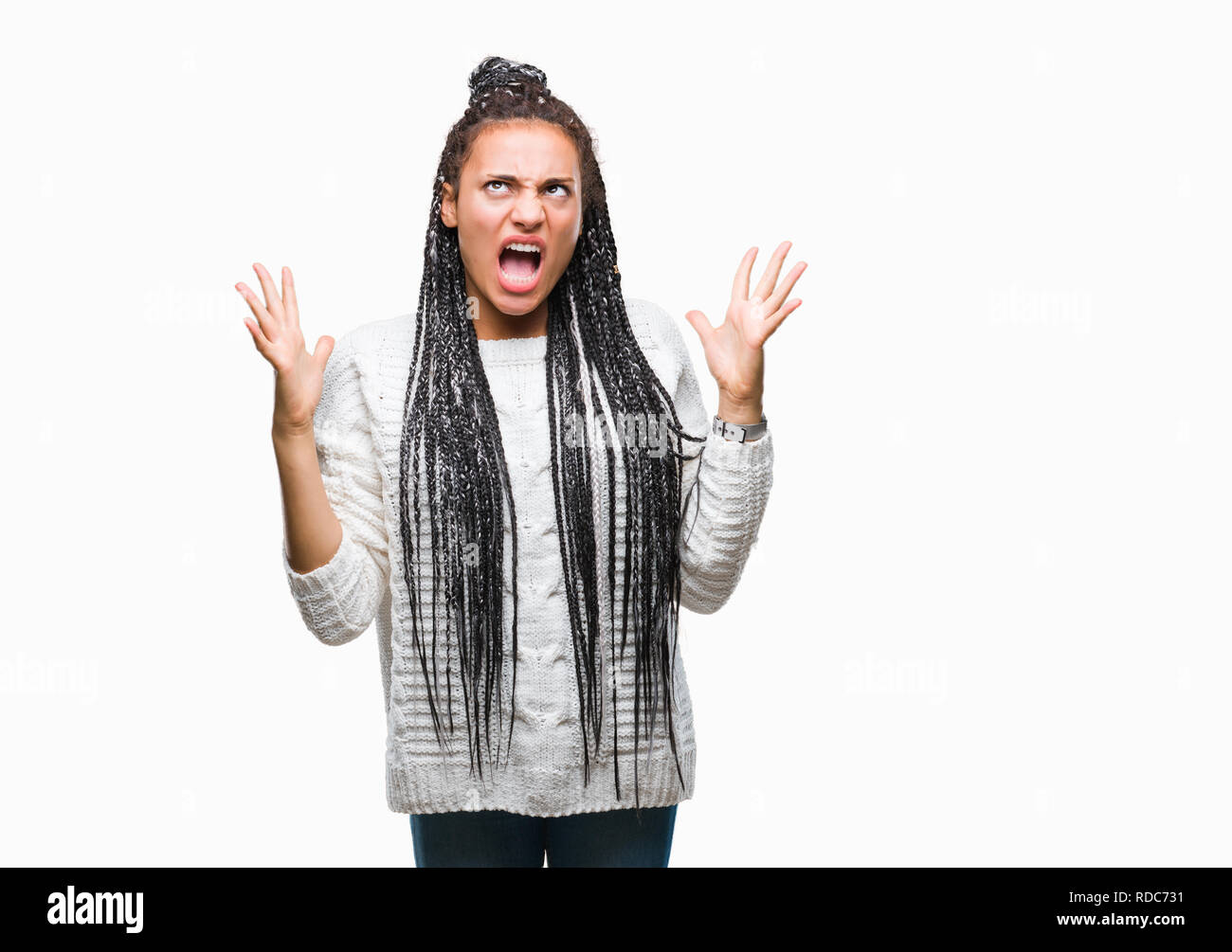 Young braided hair african american girl wearing sweater over isolated ...