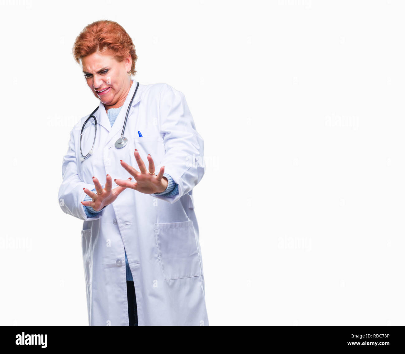 Senior caucasian doctor woman wearing medical uniform over isolated ...