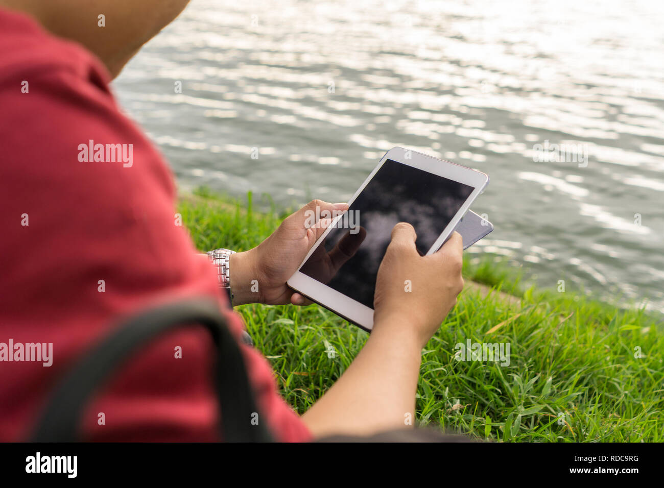 Man outdoors lake working laptop hi-res stock photography and images ...