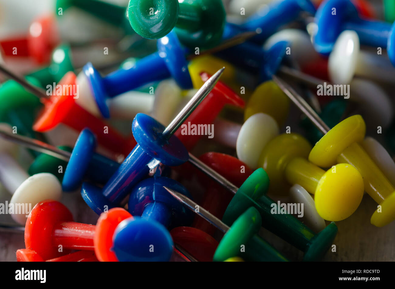 Colorful pushpins on a white board. School or business concept Stock ...
