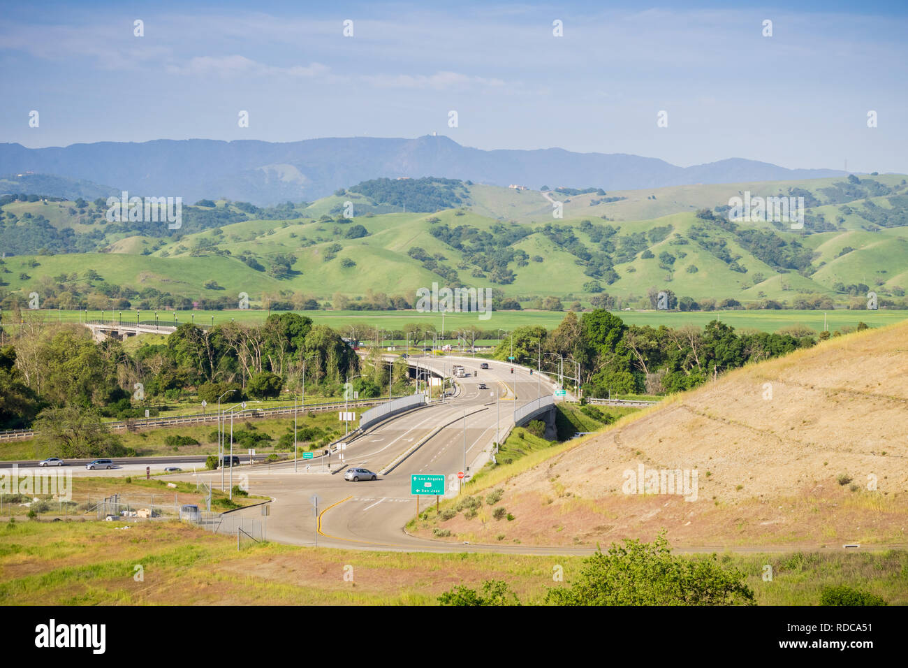 Aerial view of freeway entry, mountain background, south San Francisco ...