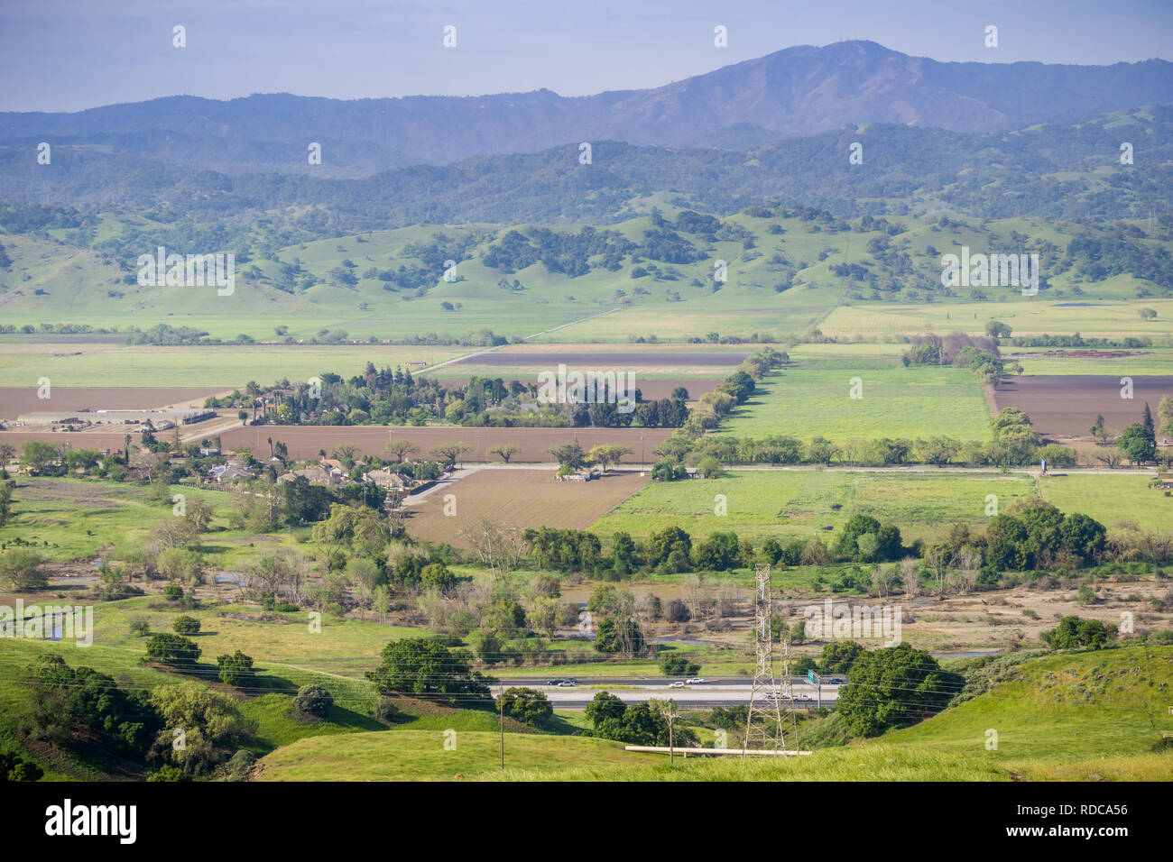 Aerial view of agricultural fields, mountain background, south San ...