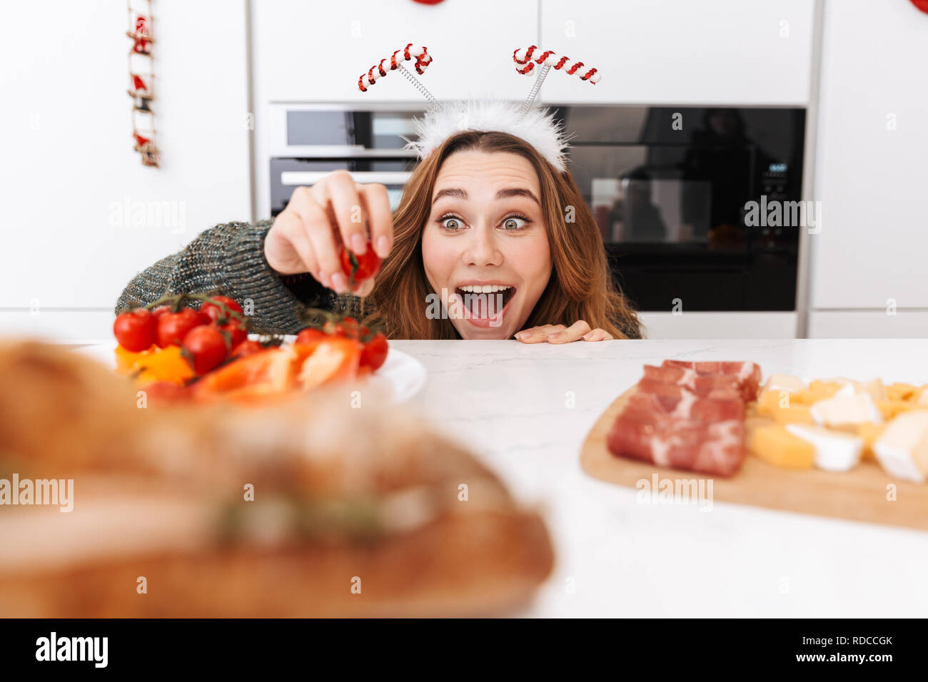 Girl under a table hi-res stock photography and images - Alamy