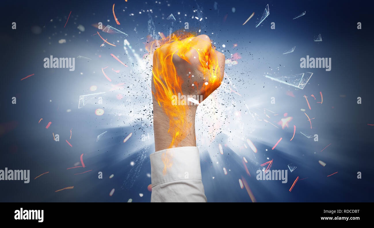 Hand hits strongly and makes fire beam around Stock Photo - Alamy