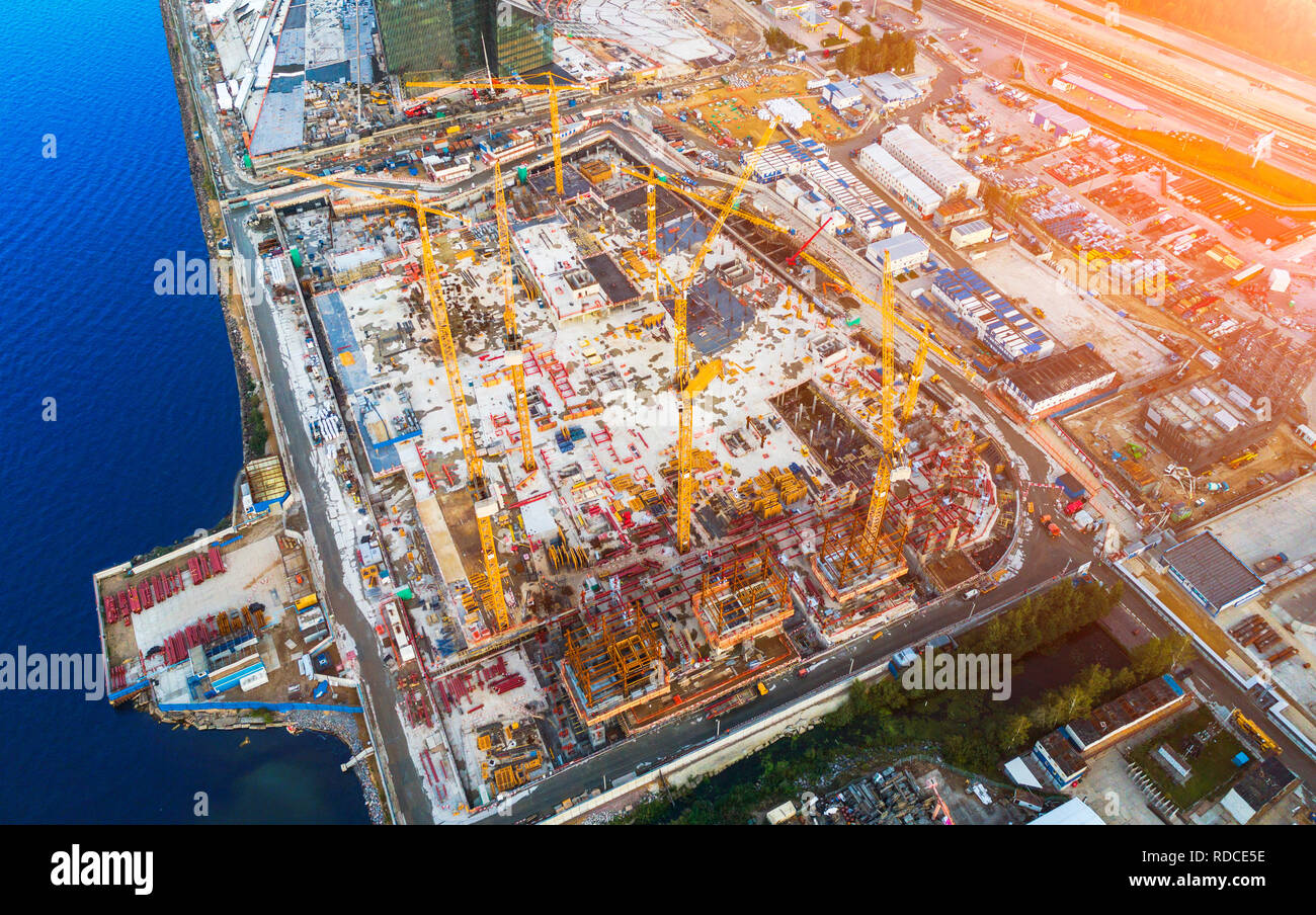 Aerial view of a Construction crane tower. Top view Crane and building ...