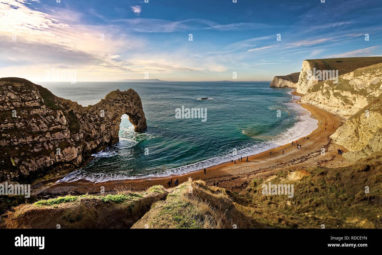 Durdle Door is a natural limestone arch on the Jurassic Coast near ...