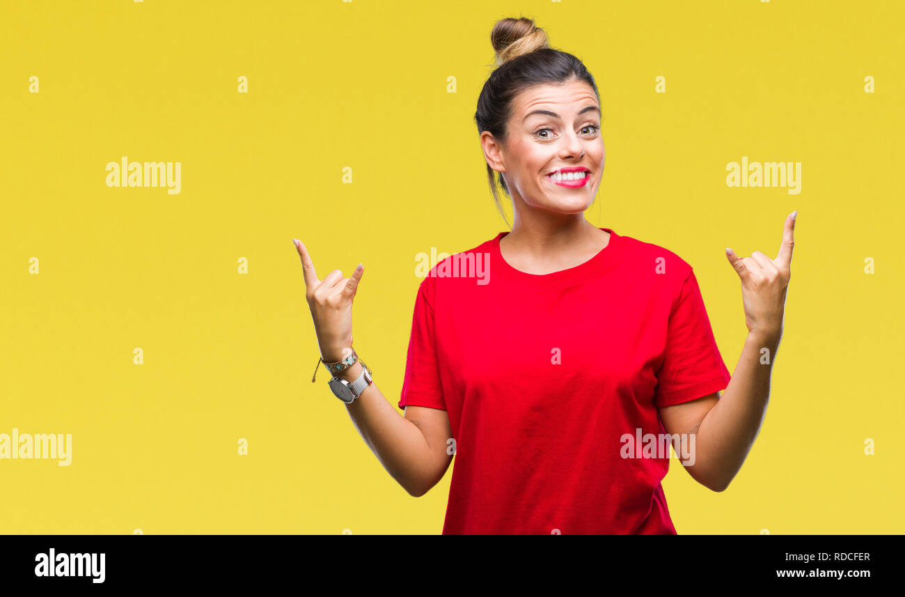Young beautiful woman over isolated background shouting with crazy ...