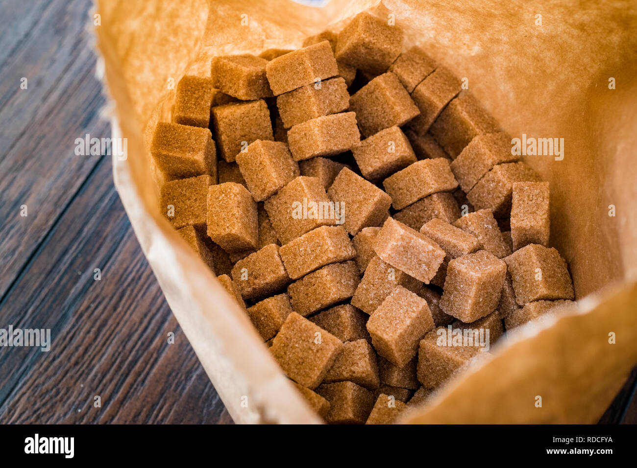 Package of Raw Organic Brown Sugar Cube in Craft Paper Ready to Eat ...