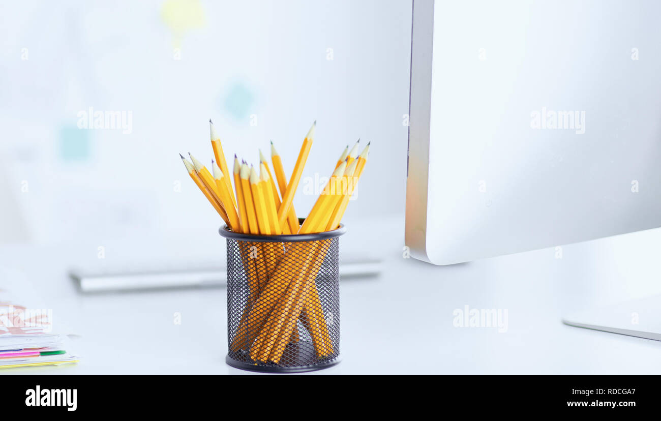 Graphite pencils in a metal grid-container. Concept Stock Photo - Alamy