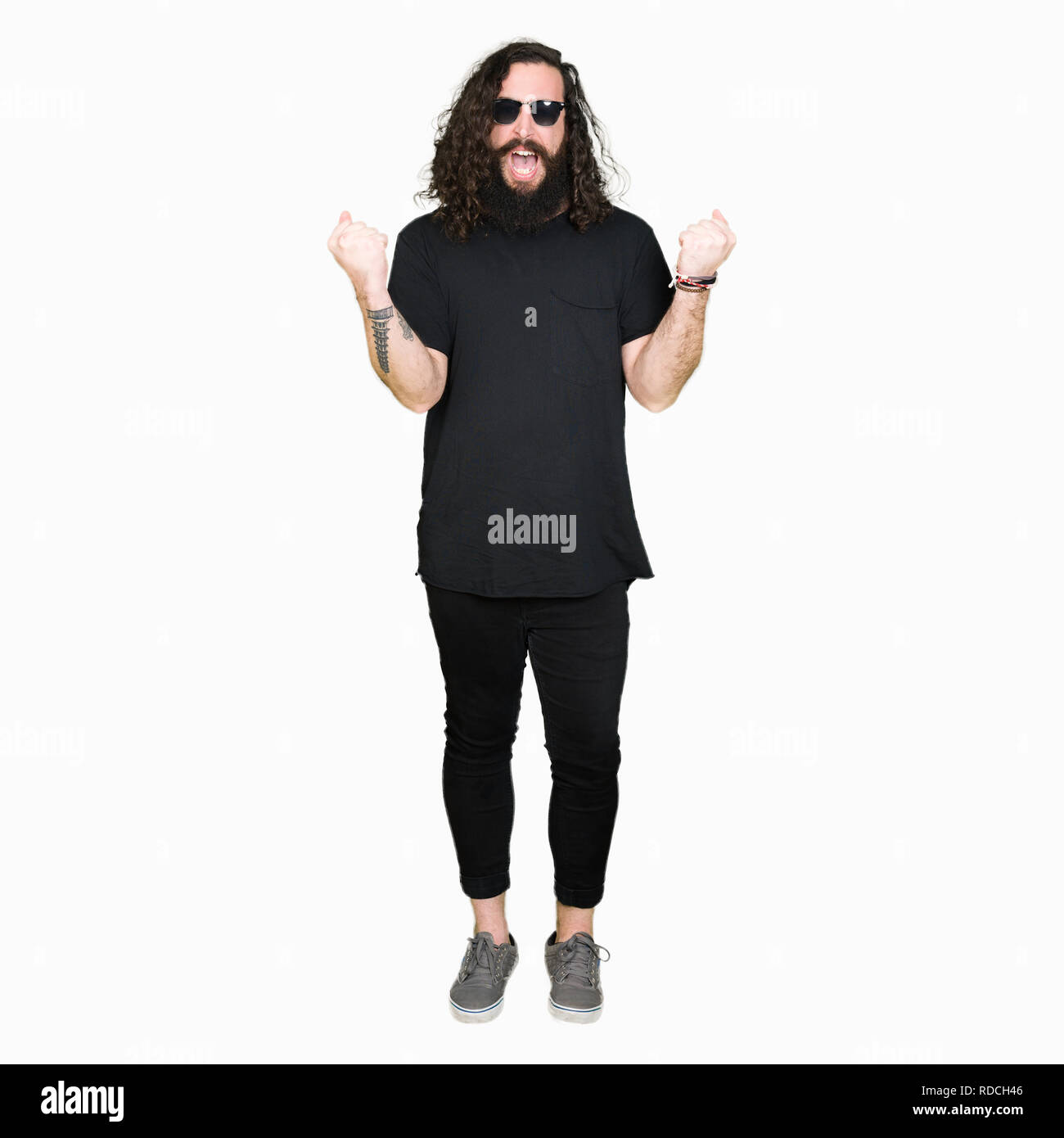 Hispanic man beard celebrating success Cut Out Stock Images & Pictures ...