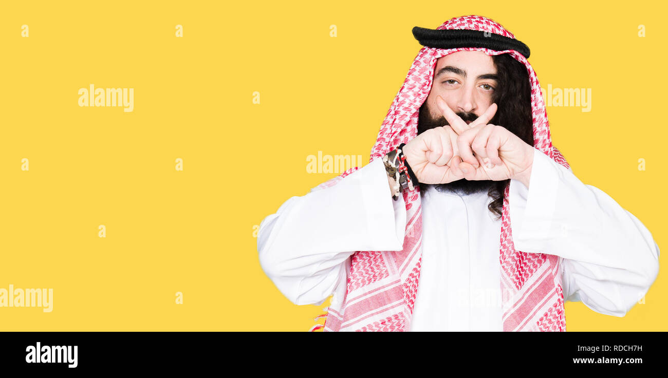 Arabian business man with long hair wearing traditional keffiyeh scarf ...
