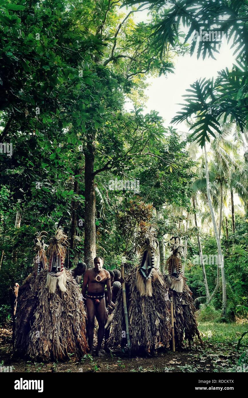 Olal, Ambrym Island / Vanuatu - JUL 10 2016 : rom dancers and a village ...