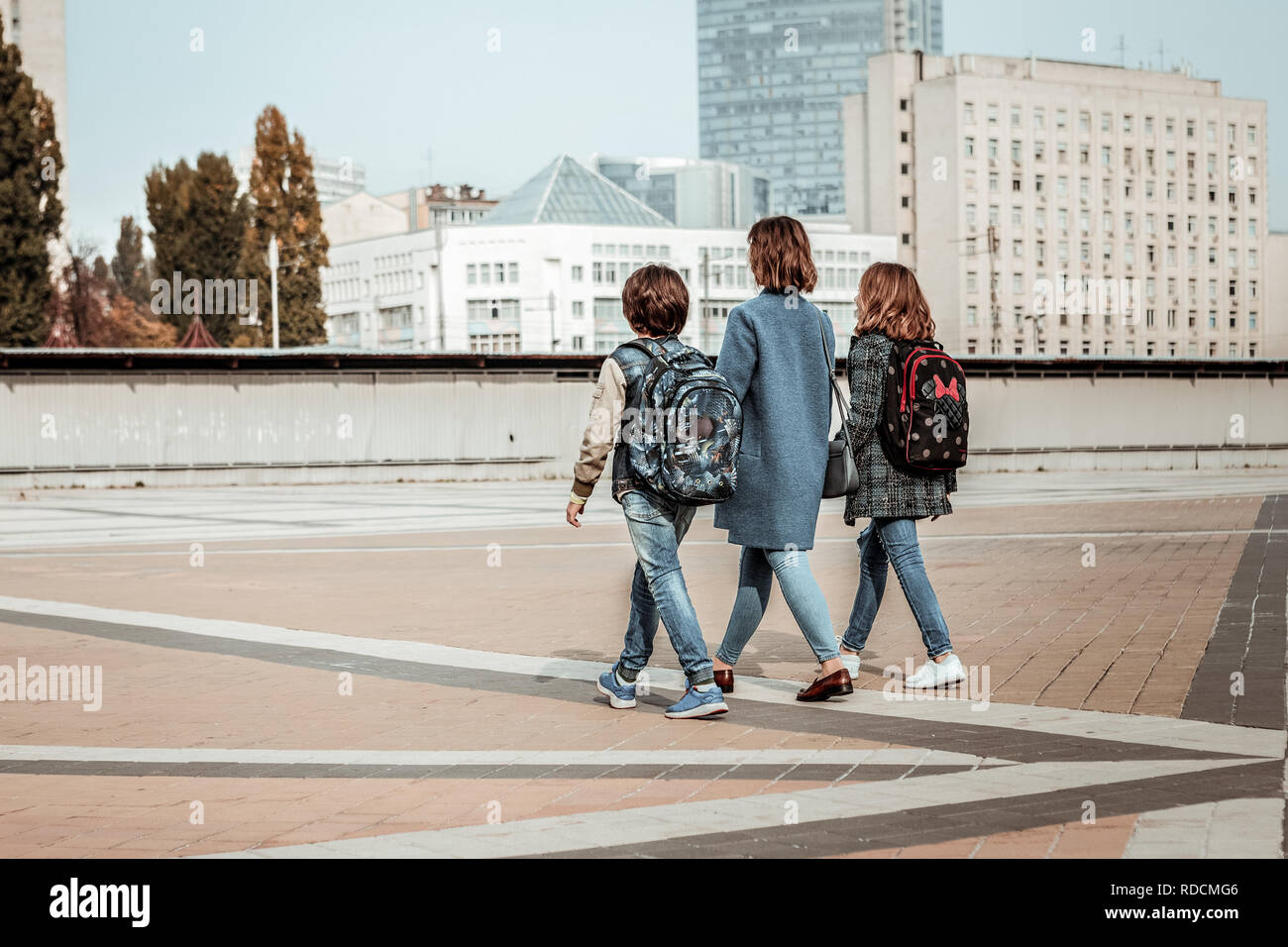 Children having an excursion with their mother Stock Photo - Alamy