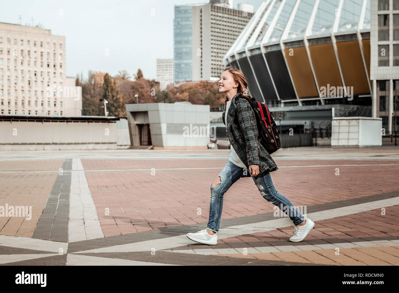Smiling Kid going back home after school Stock Photo - Alamy
