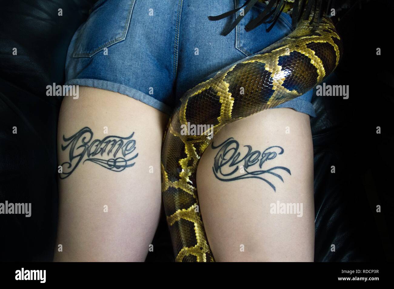 Snake Tattoo Wrapped Around Leg