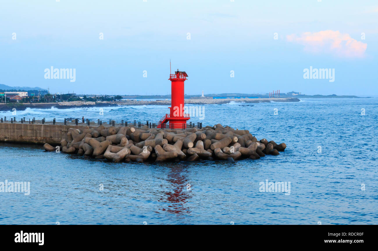 Red Lighthouse on the seawall in Jeju Island, Korea Stock Photo - Alamy