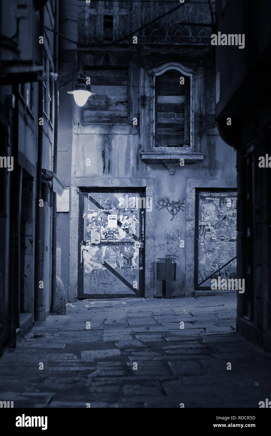 Night view of a messy alley of old Porto, Portugal Stock Photo - Alamy