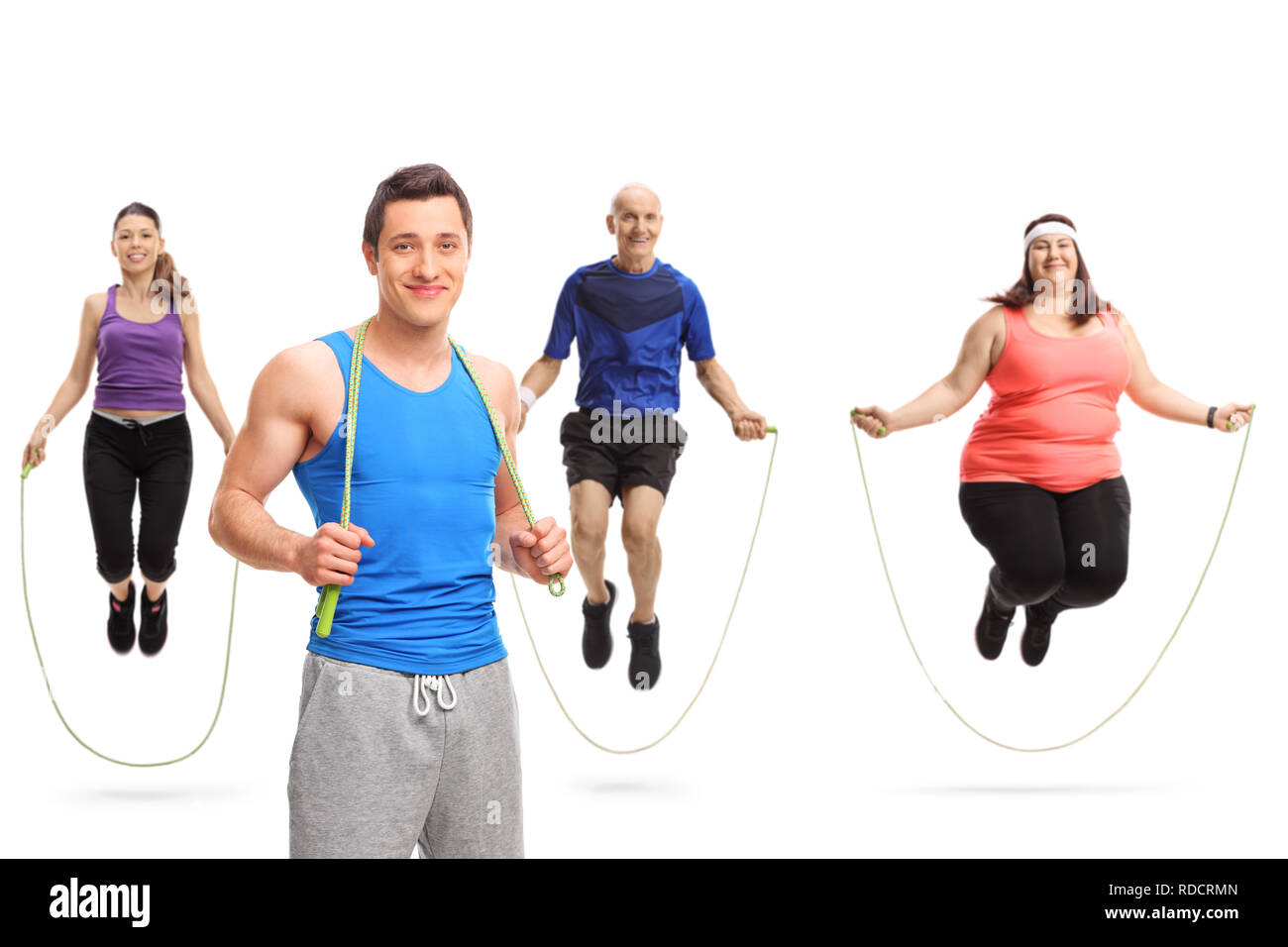 Young male athlete posing with a skipping rope and a group of people ...