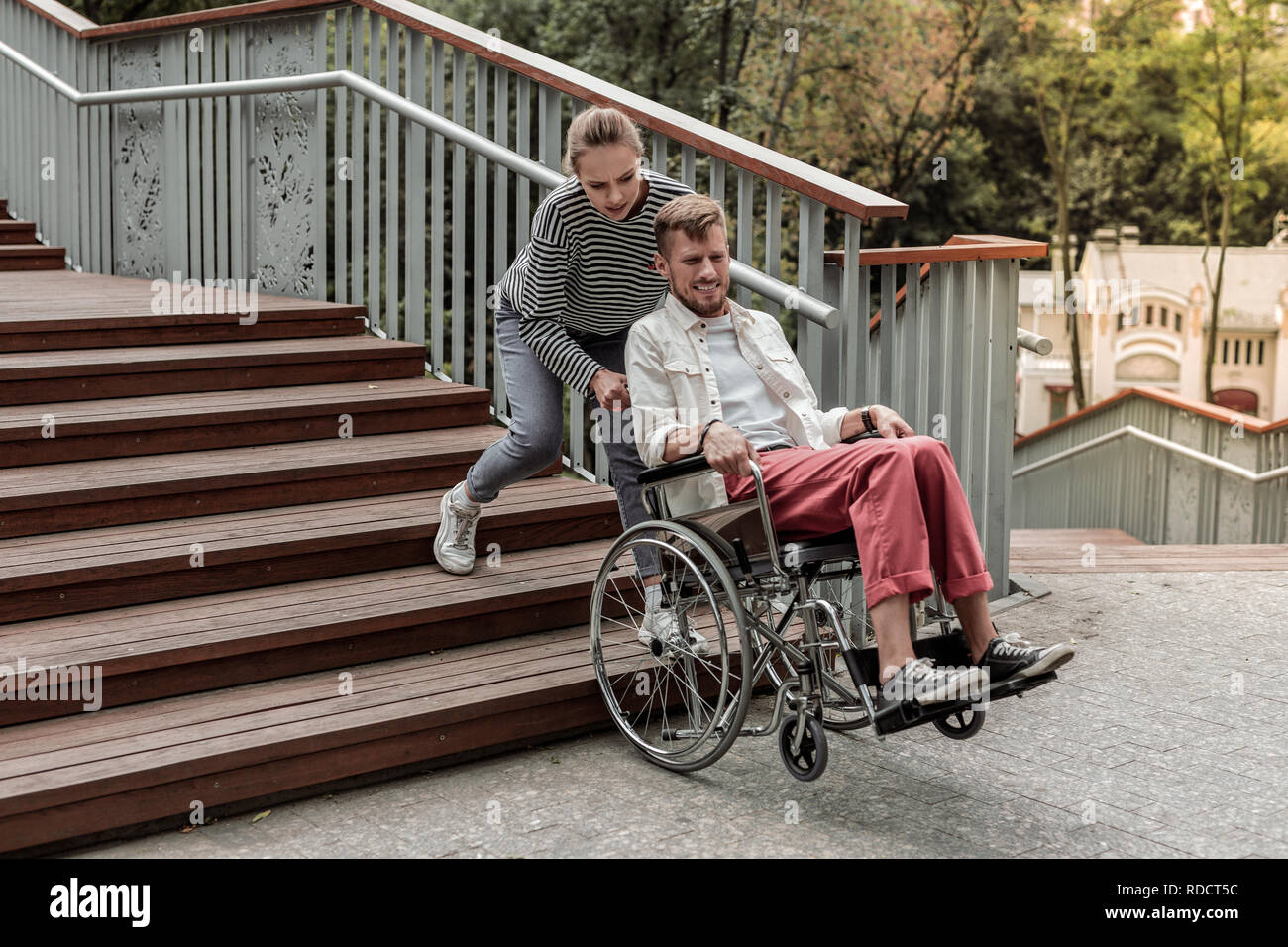 Helping the handicapped hi-res stock photography and images - Alamy