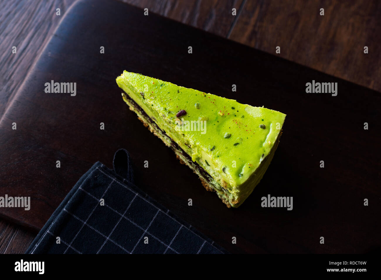 Matcha Green Tea Layer Cake Slice on Dark Wooden Board. Organic Dessert ...