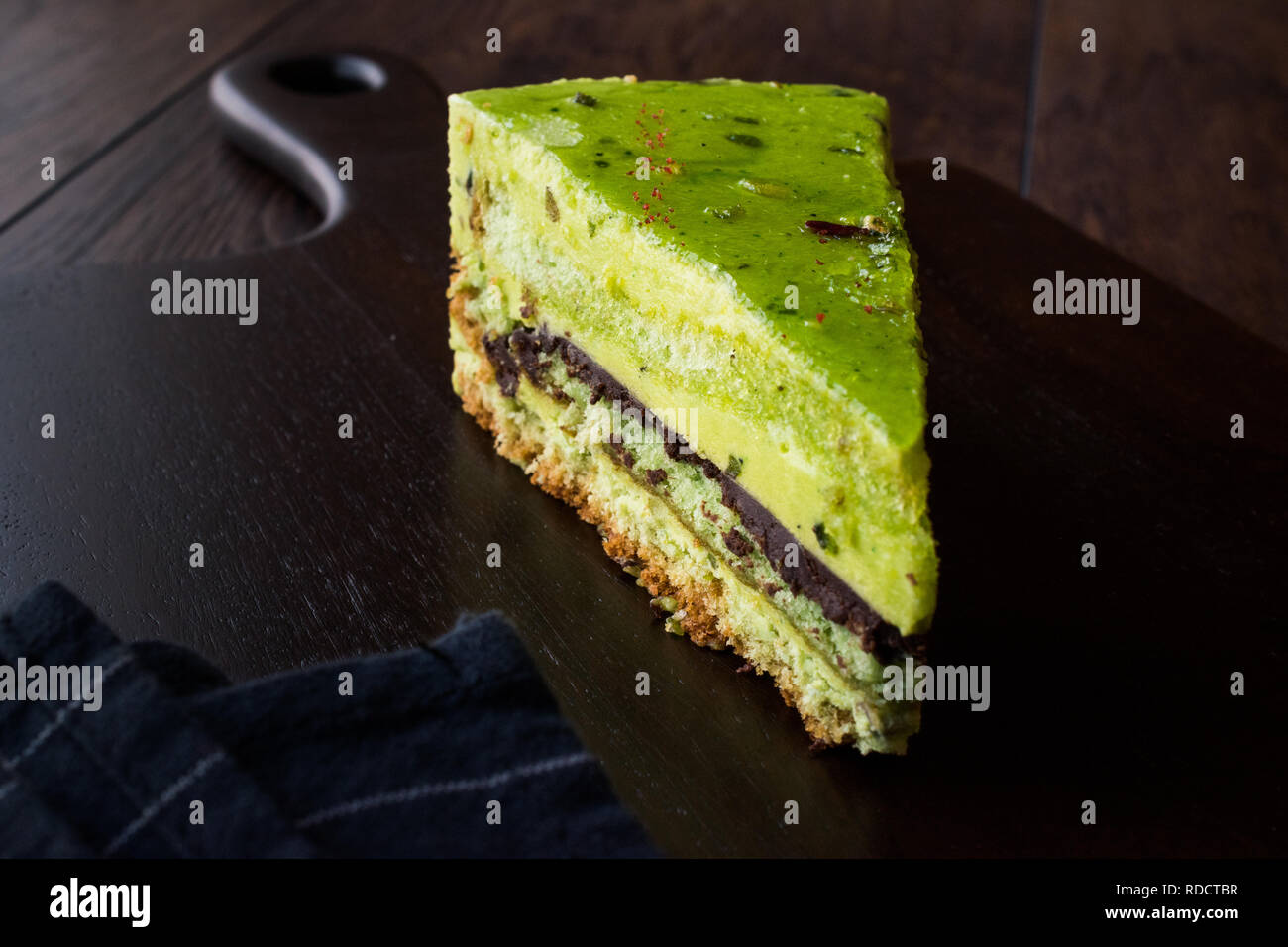Matcha Green Tea Layer Cake Slice on Dark Wooden Board. Organic Dessert ...