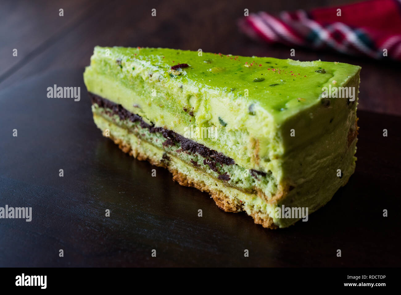 Matcha Green Tea Layer Cake Slice on Dark Wooden Board. Organic Dessert ...