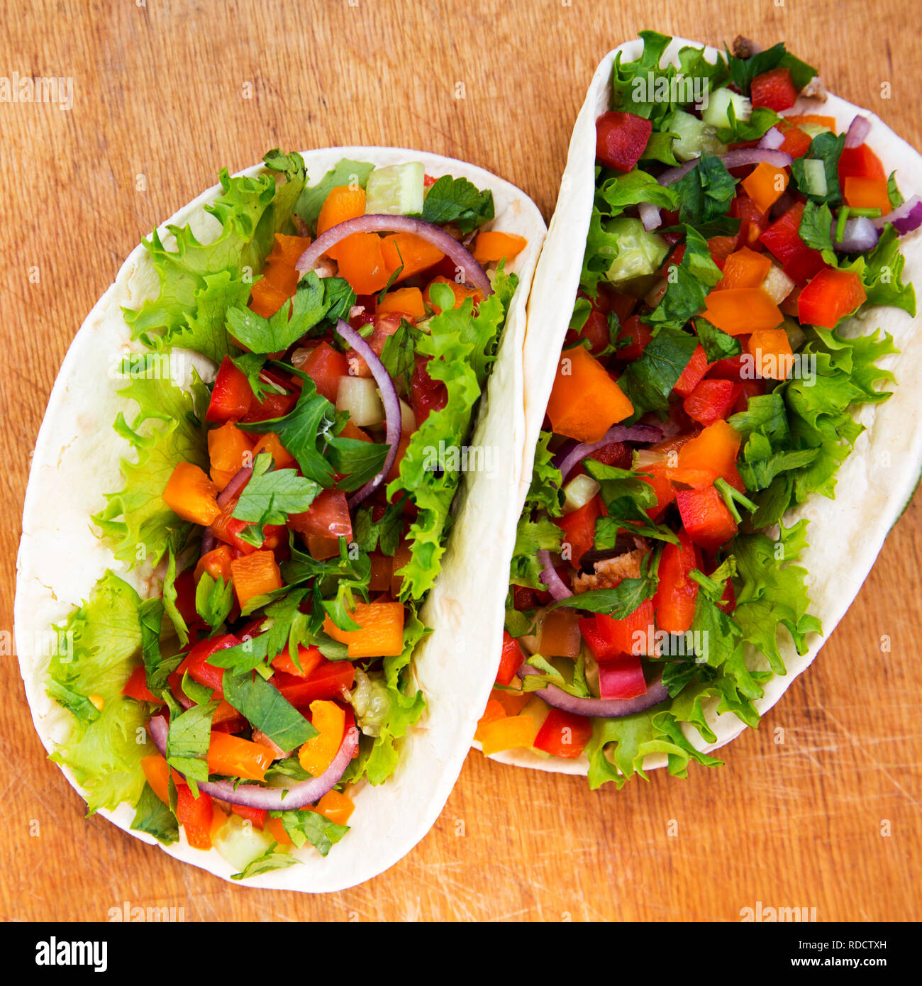 Beef tacos with salad and pepper, top view. From above, overhead. Close ...