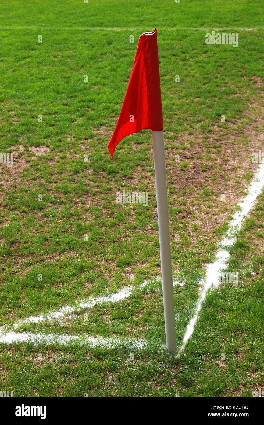 red corner flag on a soccer field Stock Photo - Alamy