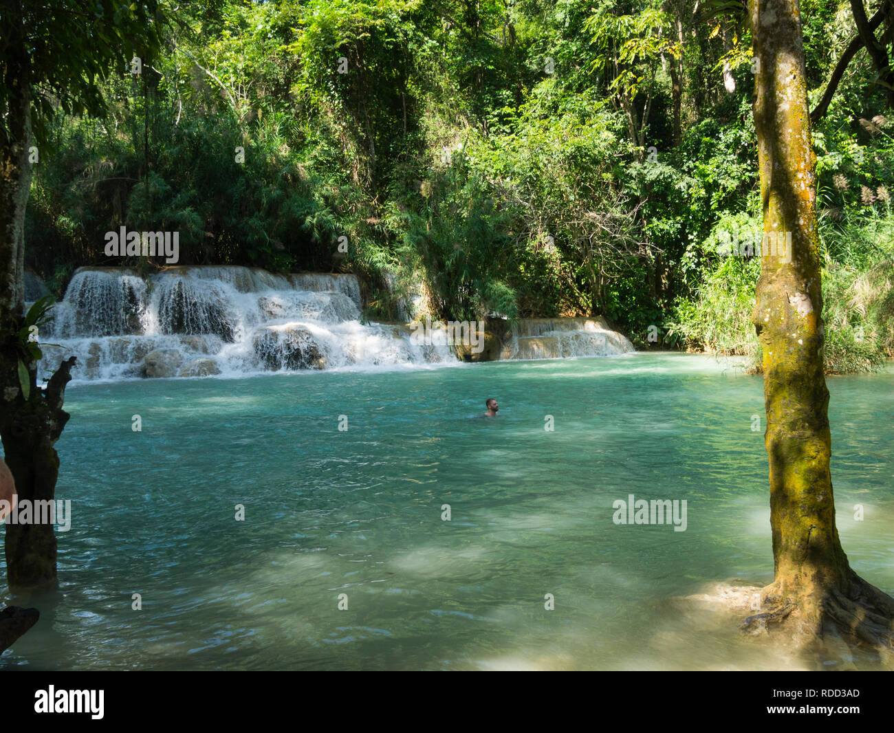 Cascade in part of three tiered Tat Kuang Si Waterfalls in Kuang Si ...