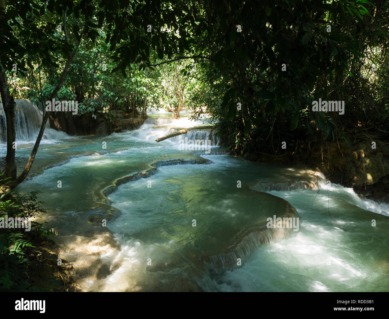 Cascade in part of three tiered Tat Kuang Si Waterfalls in Kuang Si ...