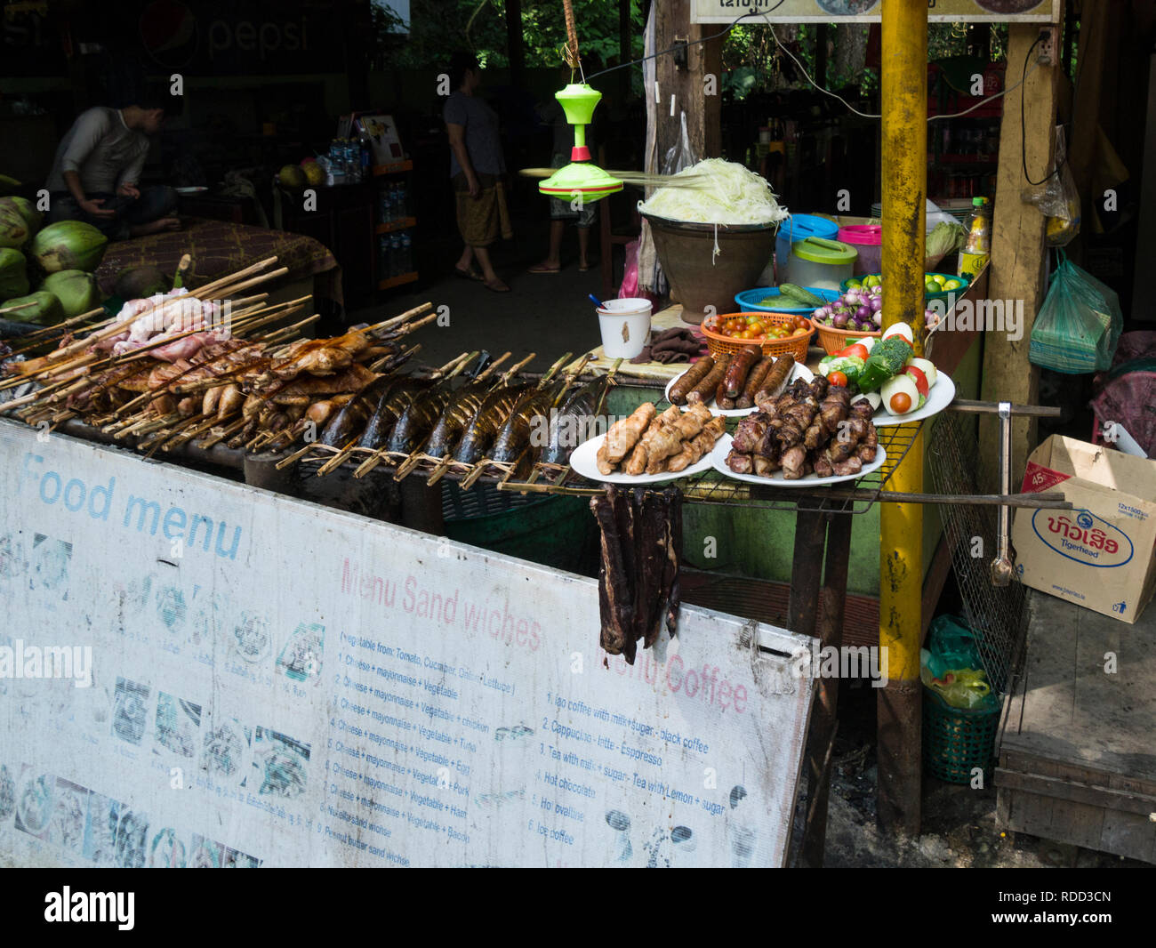 Food stall outside entrance to kuang si waterfalls park hi-res stock ...