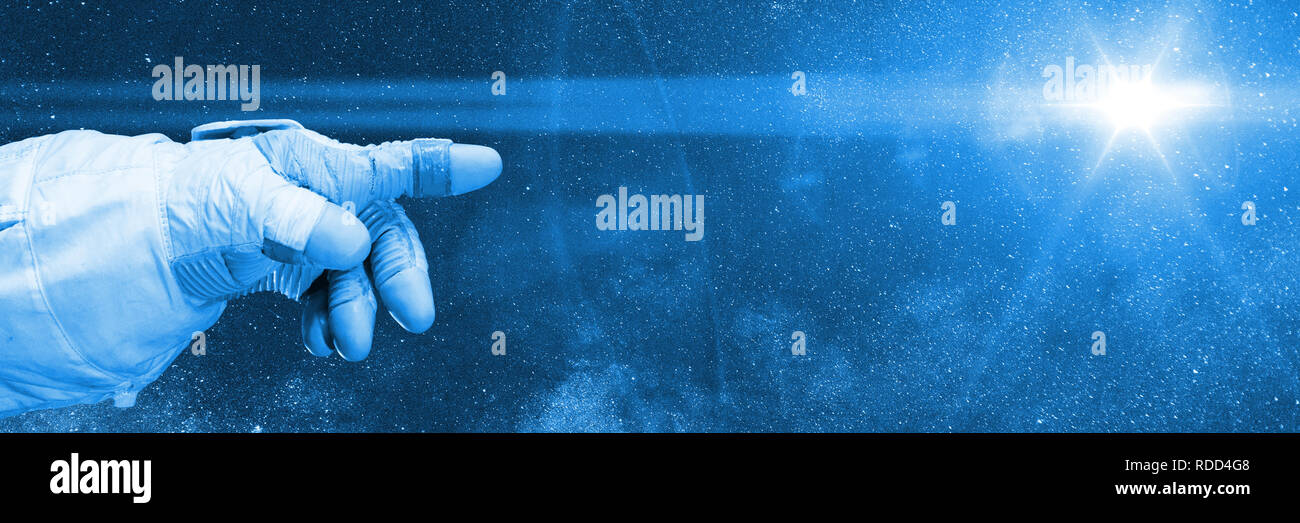 astronaut pointing to a bright blue star (3d illustration, background ...
