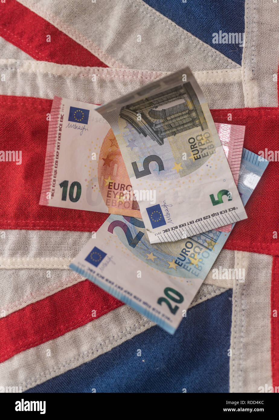 euro coins on Union flag Stock Photo - Alamy