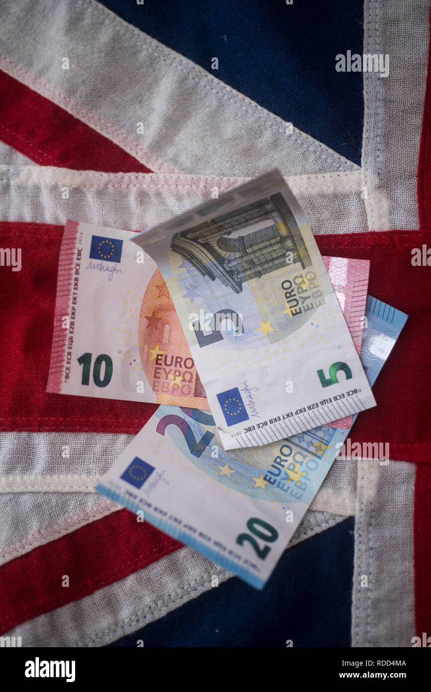 euro coins on Union flag Stock Photo - Alamy