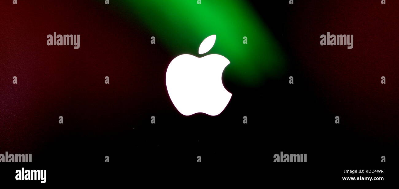 Apple logo on open laptop. Ameland Dutch Stock Photo - Alamy